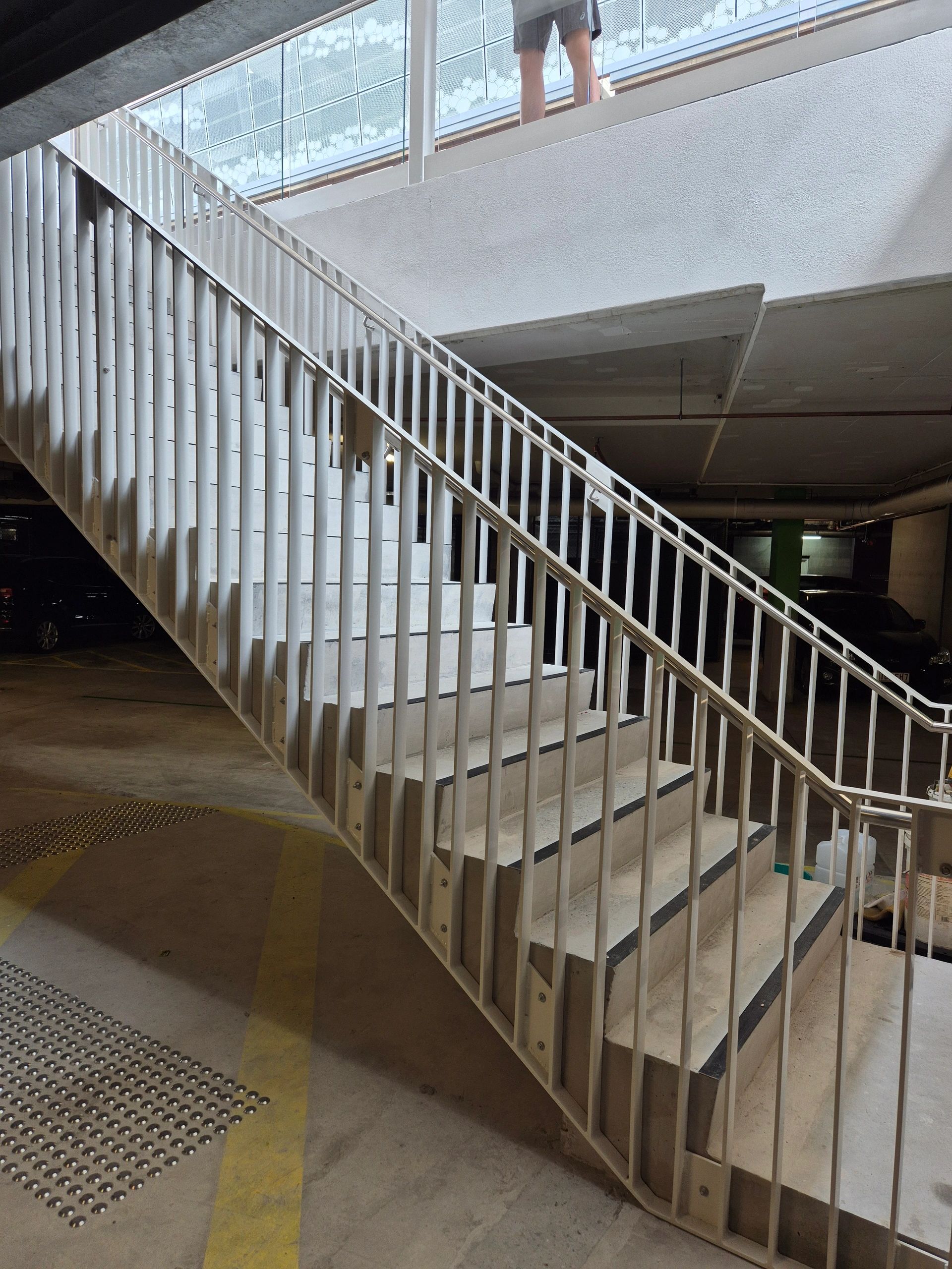 Powder coated aluminium balustrade with stainless steel handrails