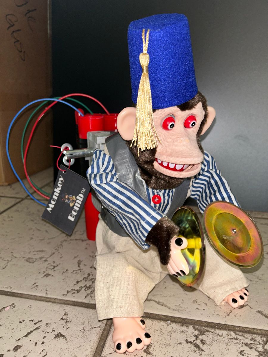 Talking Monkey Bomb® Prop Life Size Figure