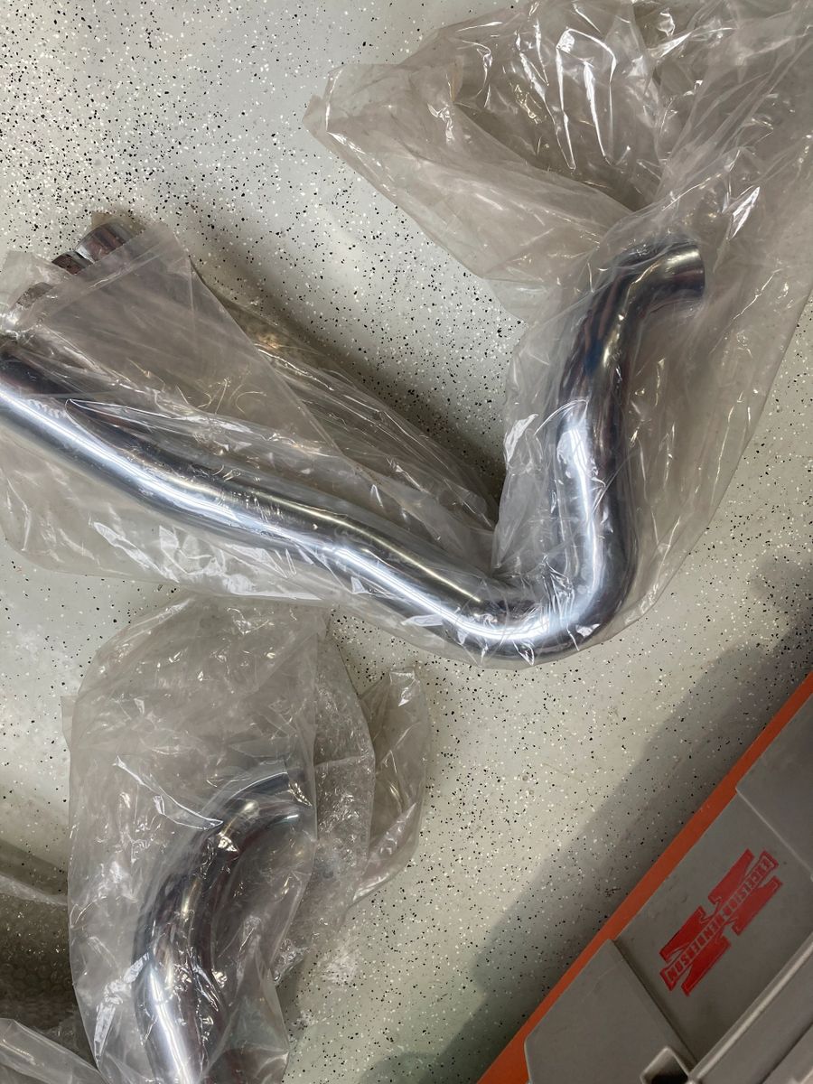 4599 0013 : Guard, Exhaust Rear