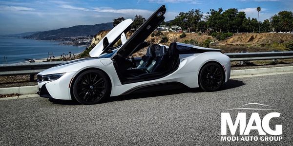 Modi Auto Group, Inc.