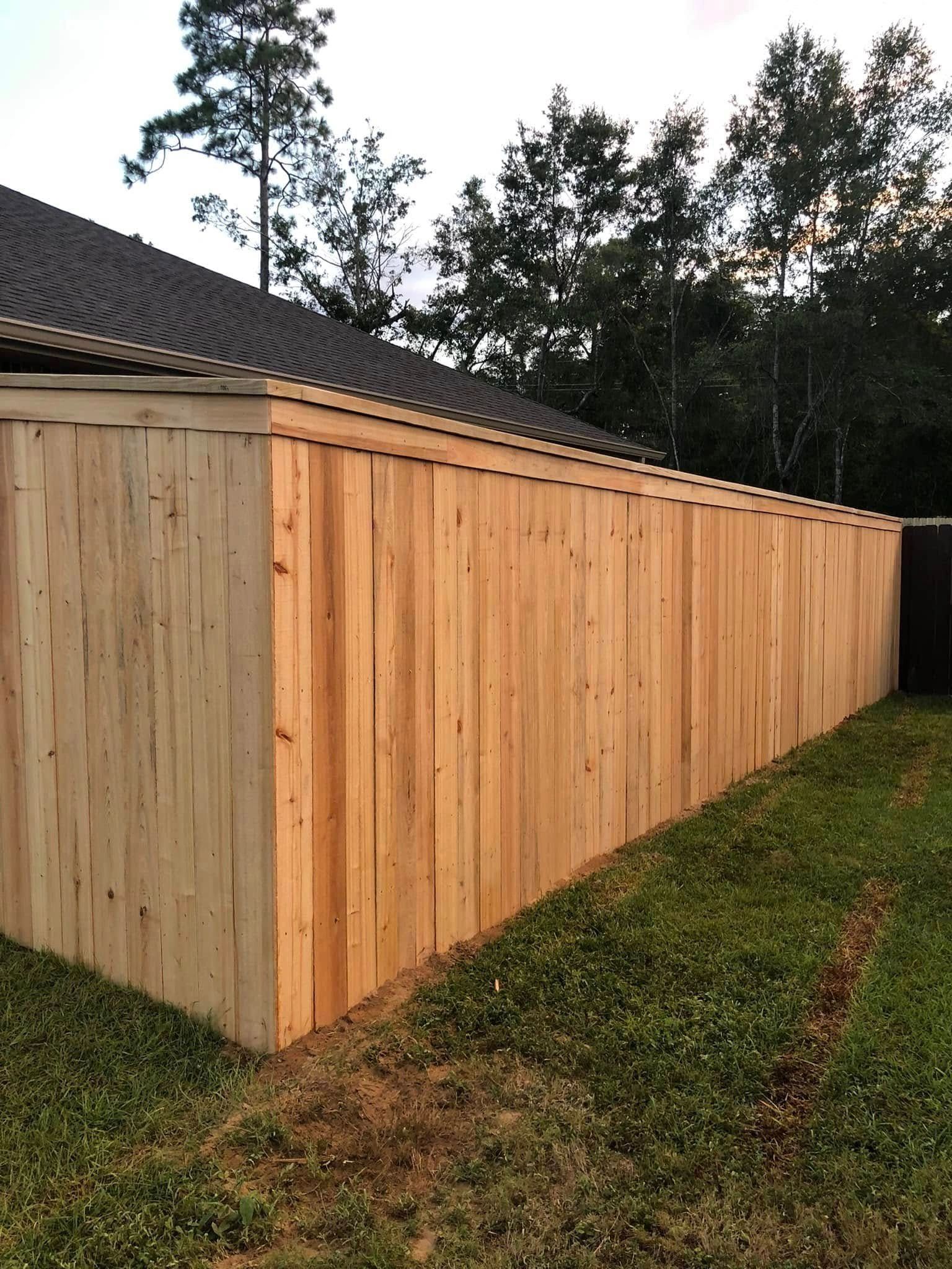Quality Fencing & Gutters - Custom Wood Fence Experts