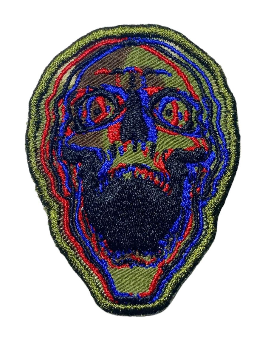 TRIPPY SKULL EMBROIDERED BADGE