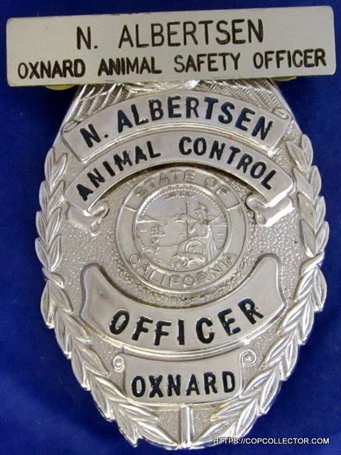 OXNARD, CALIFORNIA ANIMAL CONTROL OFFICER BADGE WITH OFFICER’S NAME TAG