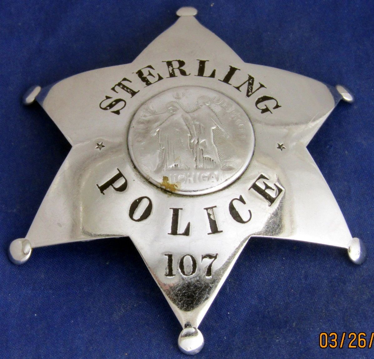 STERLING (DETROIT) POLICE OFFICER “PIE PLATE” BADGE