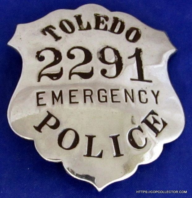 TOLEDO POLICE EMERGENCY BADGE