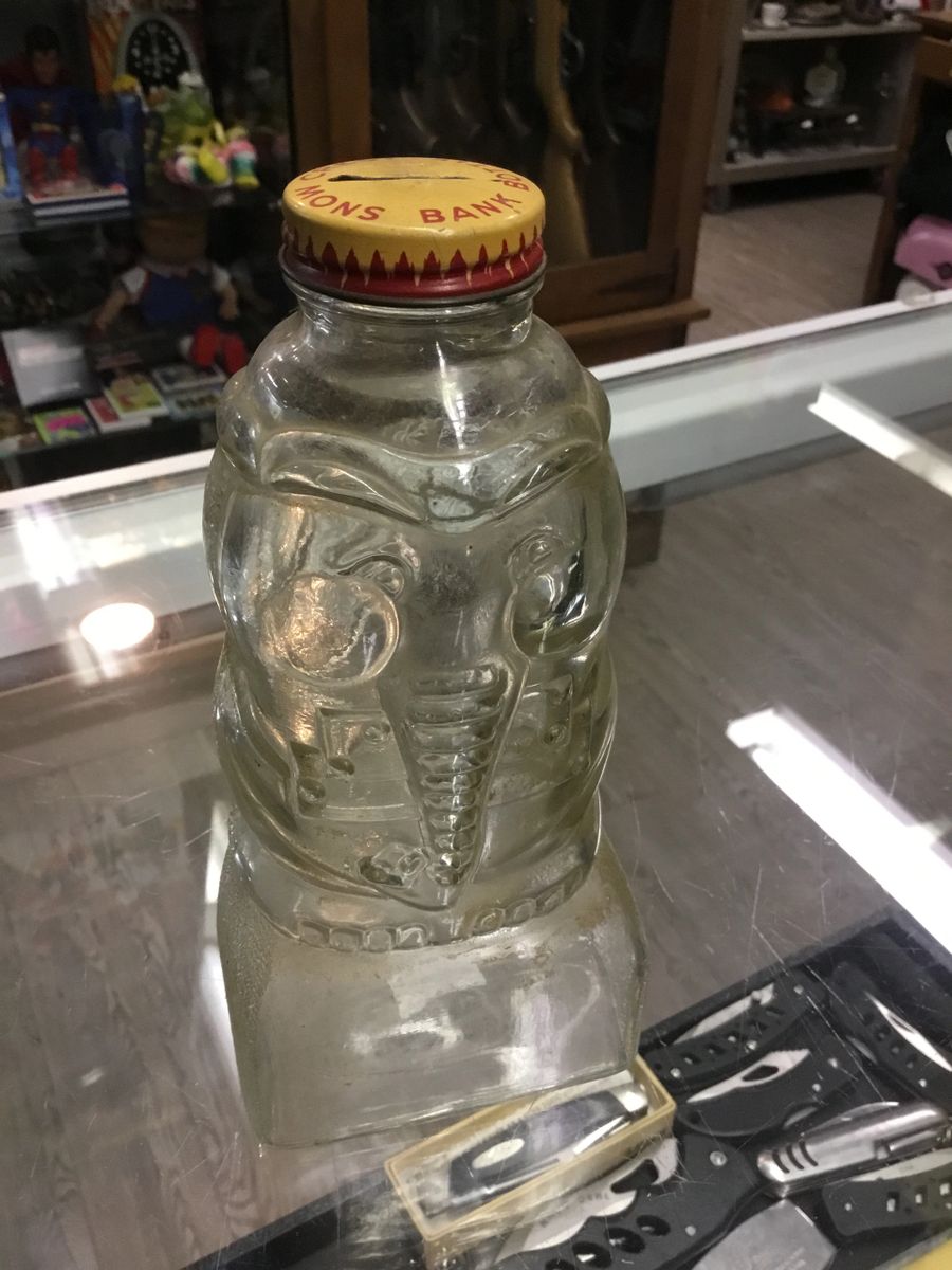 .Vintage snow crest bank bottle glass elephant castle productions with ...