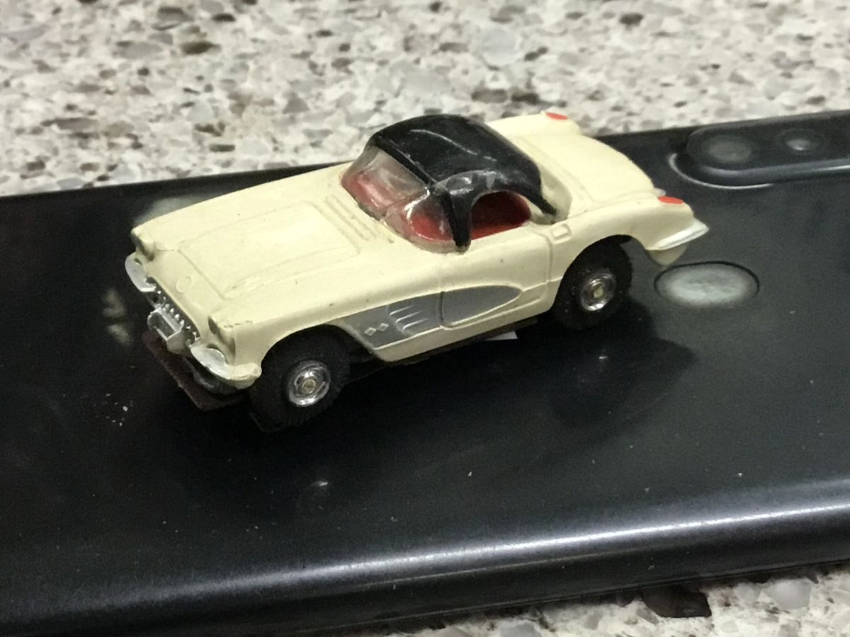 .Slot car corvette damaged.