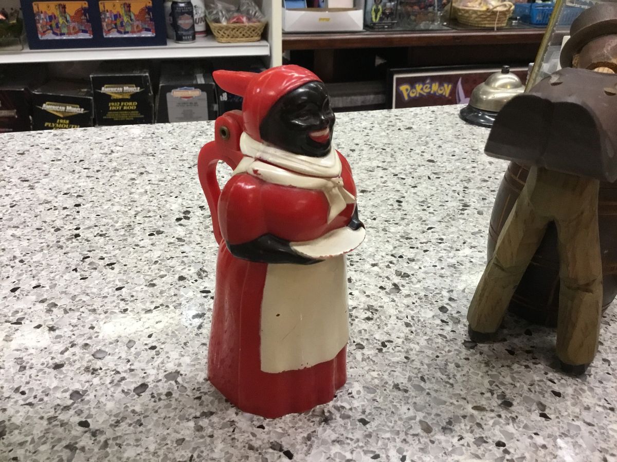1950’s mammy syrup container African Americana black face