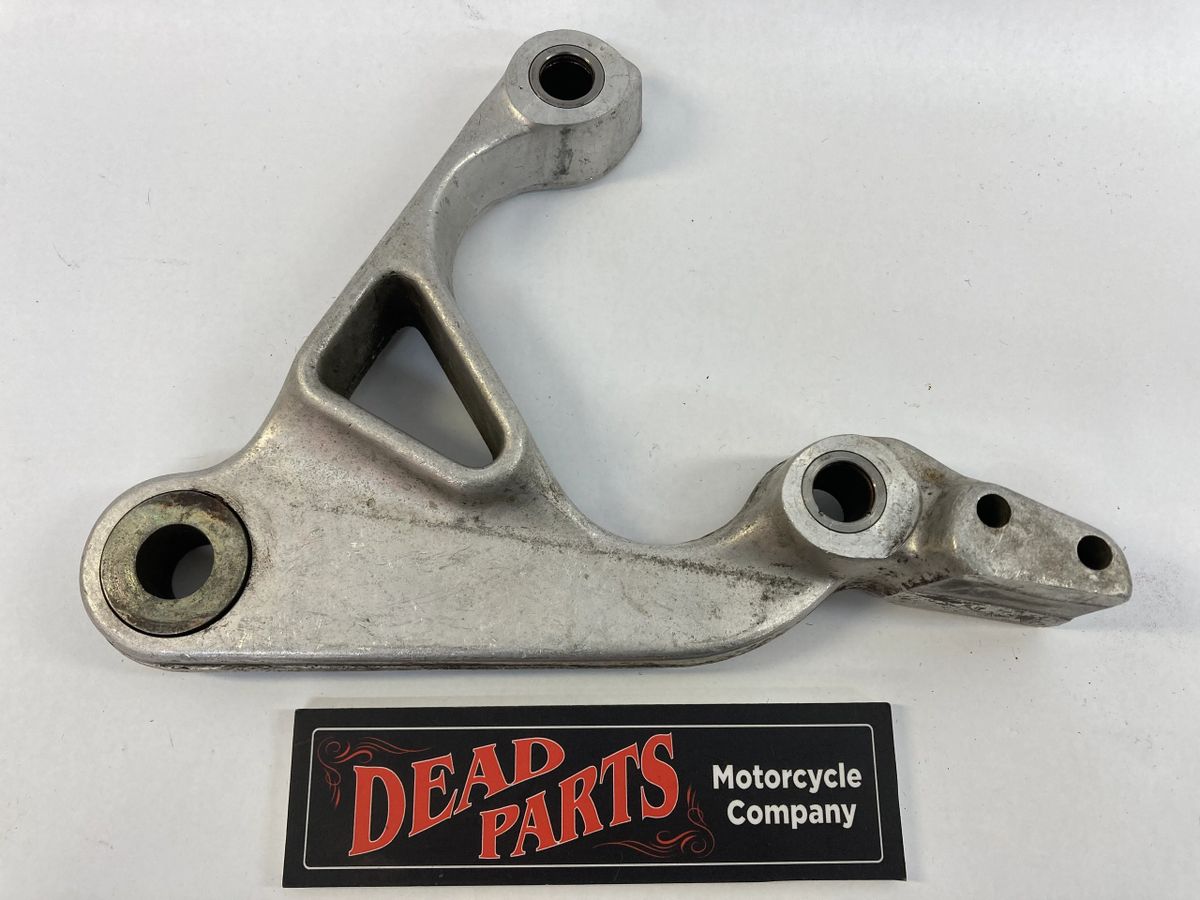 Harley Touring FLH FLHT nice rear brake caliper bracket good bushings