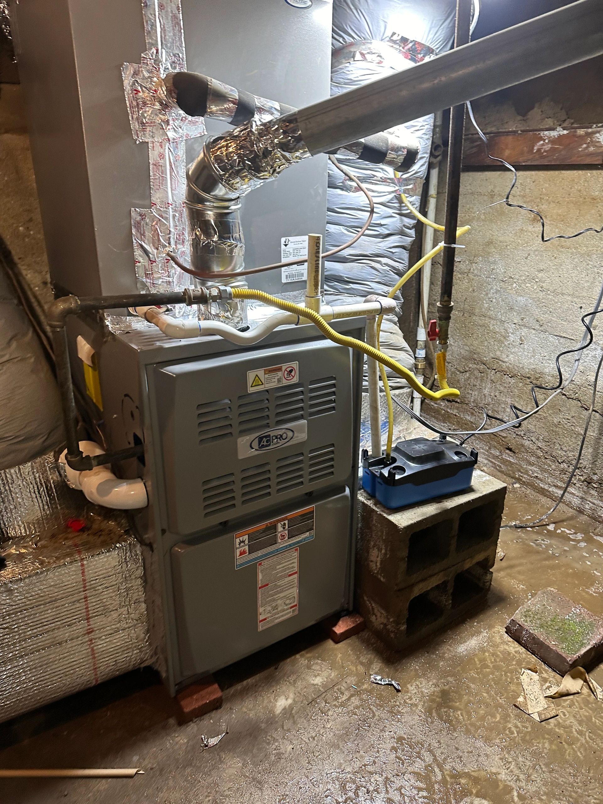 Replace 5-Ton furnace in the basement damaged by Rain