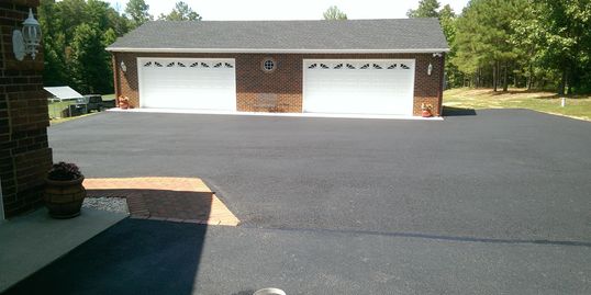Paving and sealcoating driveways Commercial and residential