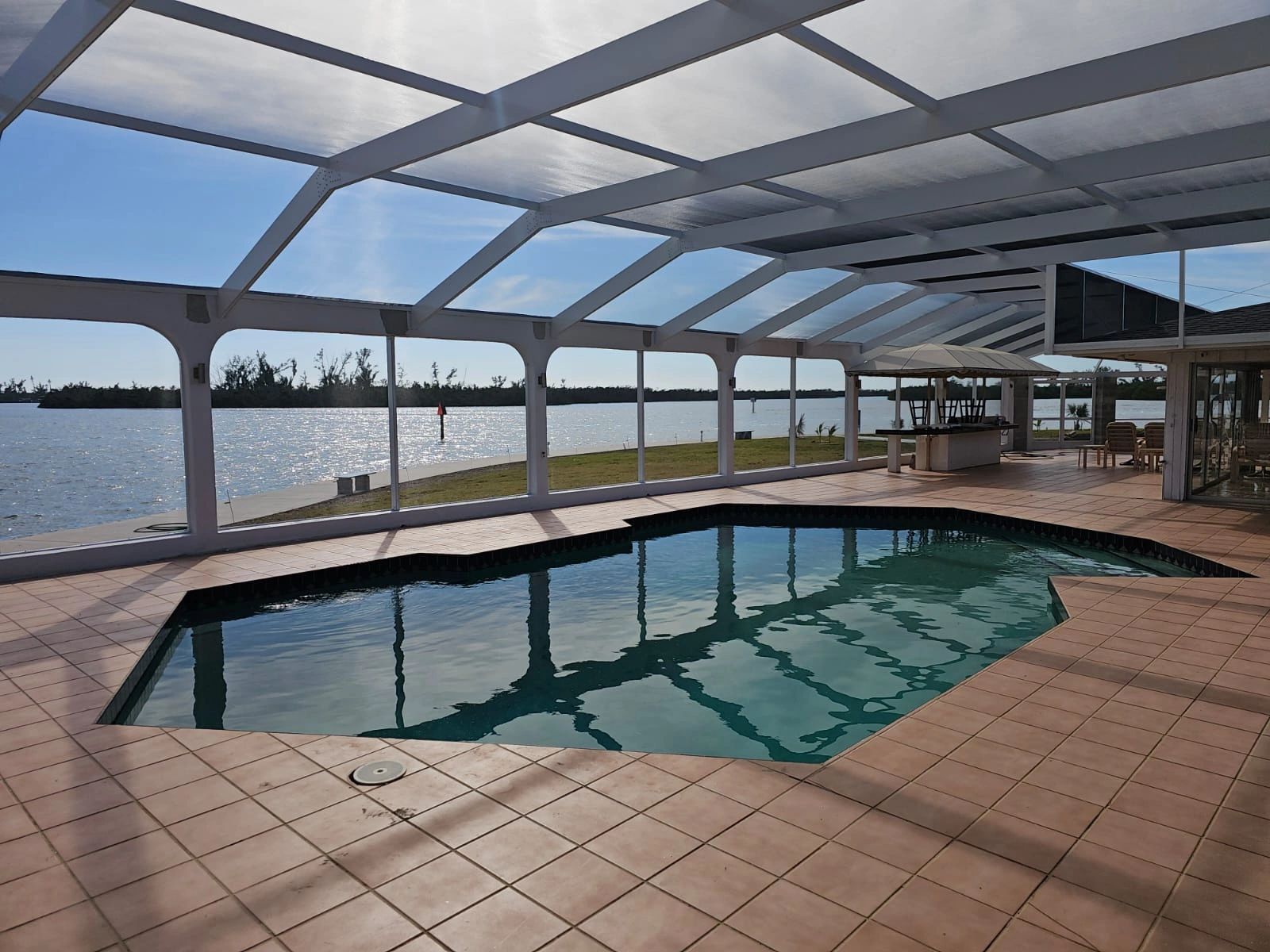 Pool Cage Painting, Rescreening and Restoration services