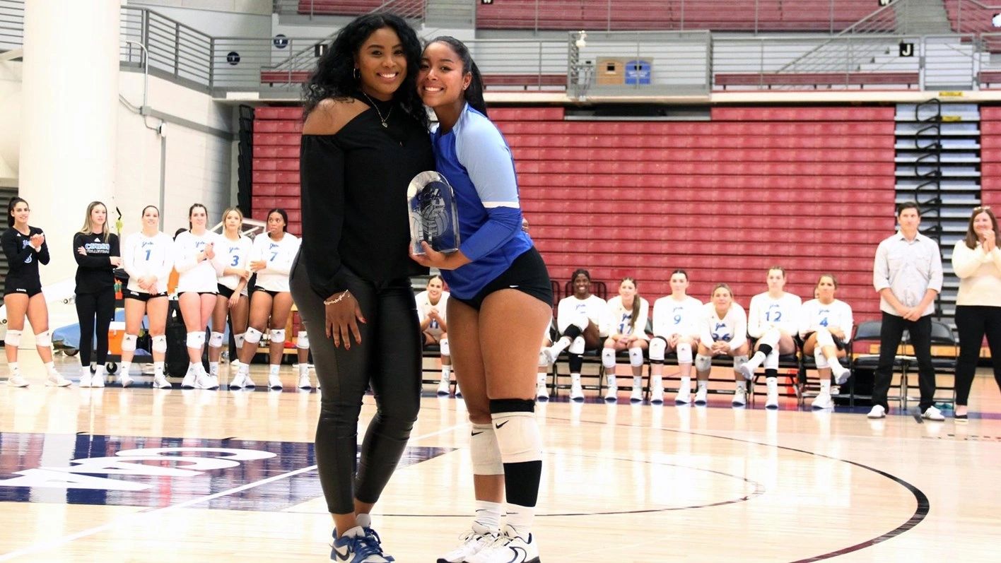 Generational handoff: Kim Ford receives her Hall of Fame Award...