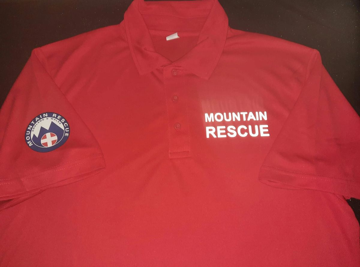 MOUNTAIN RESCUE, wicking polo shirt with MREW logo. White titanium ...