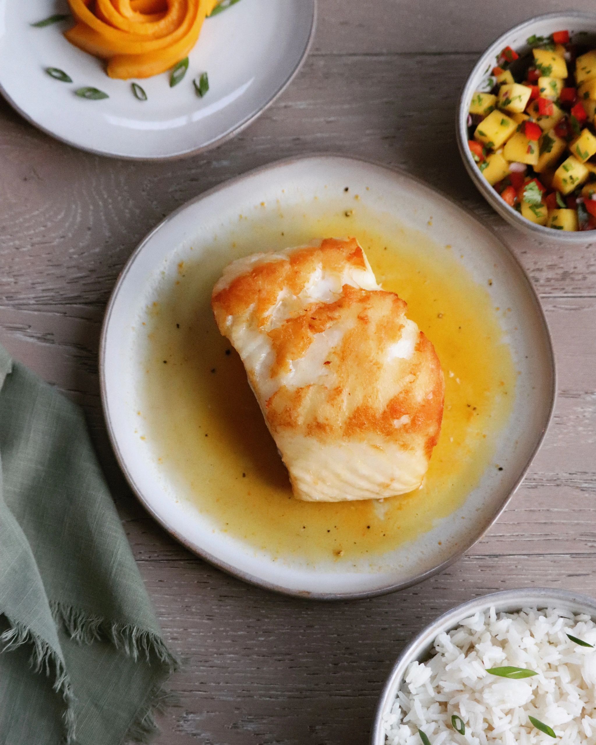 CHILEAN SEA BASS WITH MANGO SALSA AND COCONUT RICE