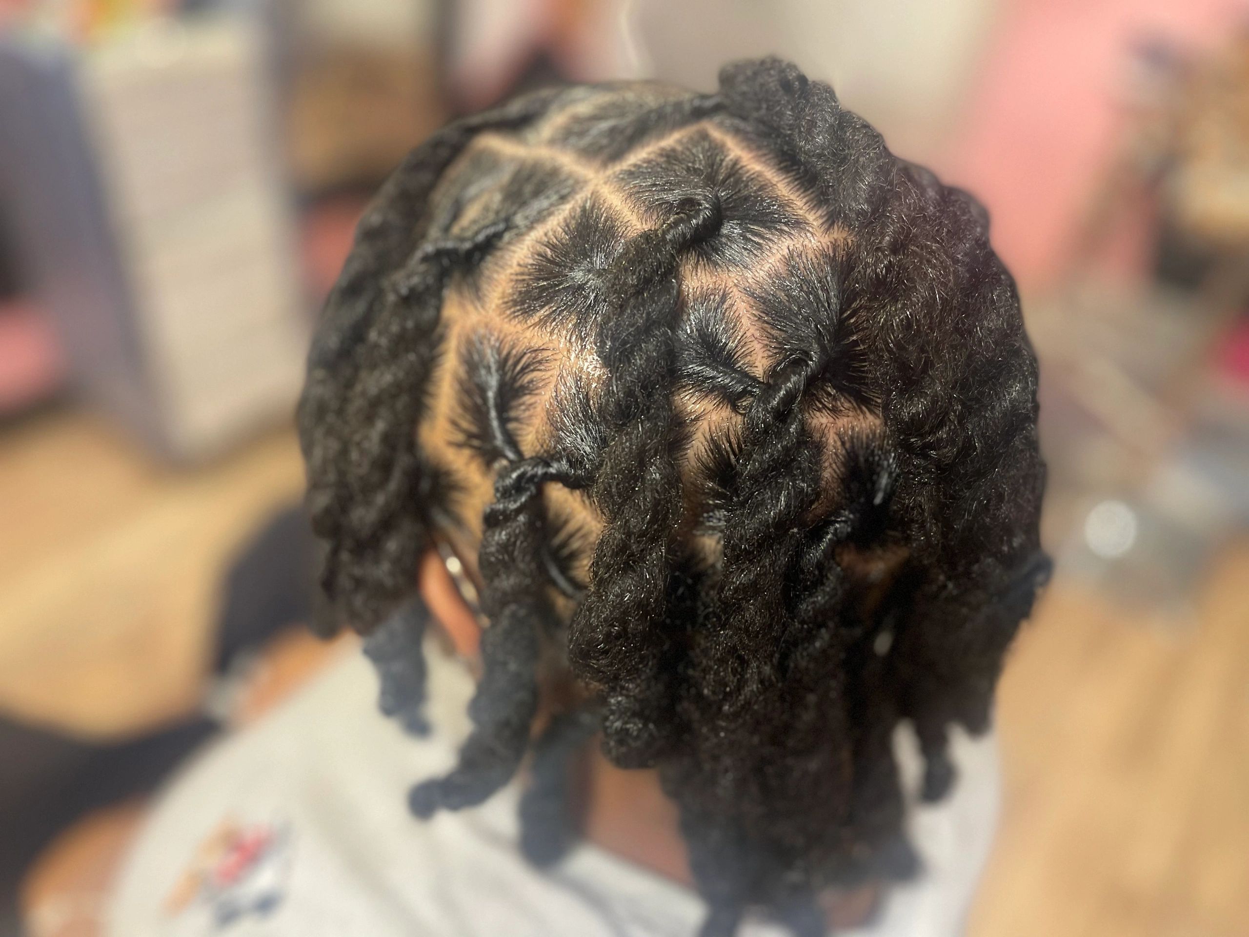 Expert Loc Retwist Services at Crowned Loc Shop