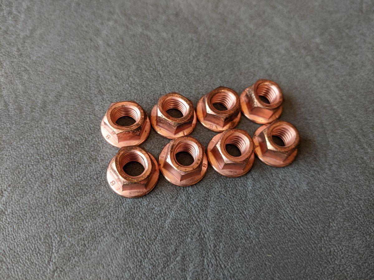 8mm X 1.25 SELF LOCKING SHOULDERED COPPER EXHAUST NUT set of eight