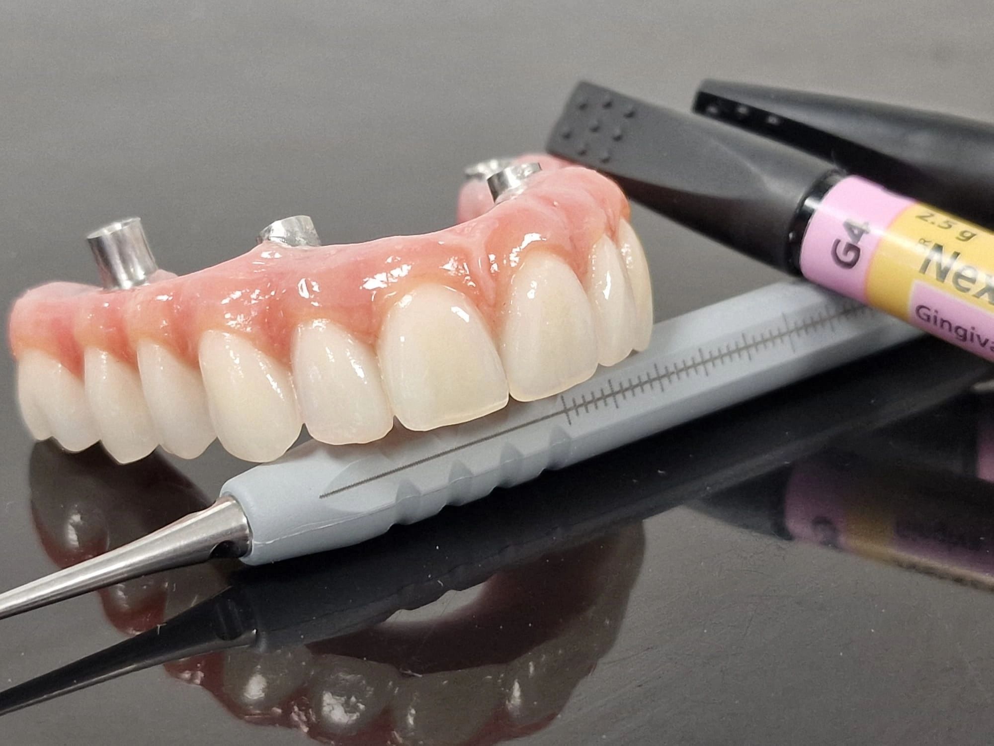 What is composite gum & teeth characterisation?