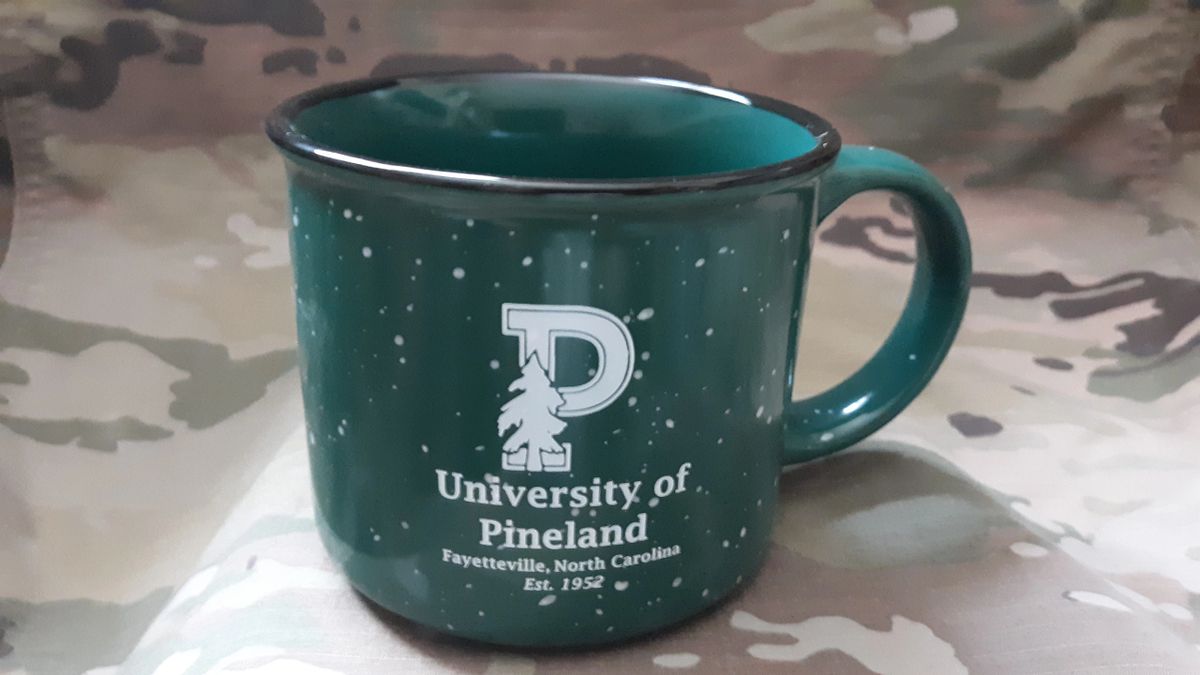 University of Pineland coffee cup