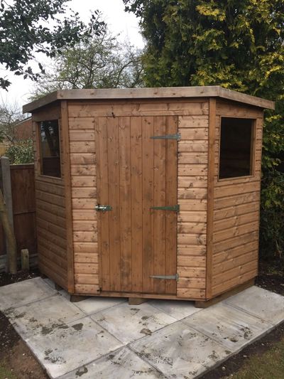 CORNER SHED | JOHNSON SECTIONALS