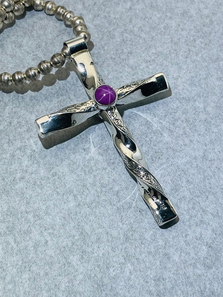 Sterling silver cross with ruby red star sapphire