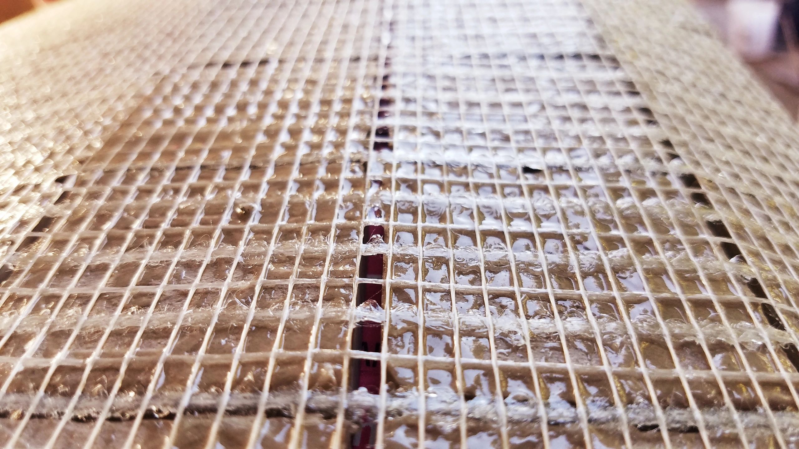 Resin-backed tiles. How to install them?