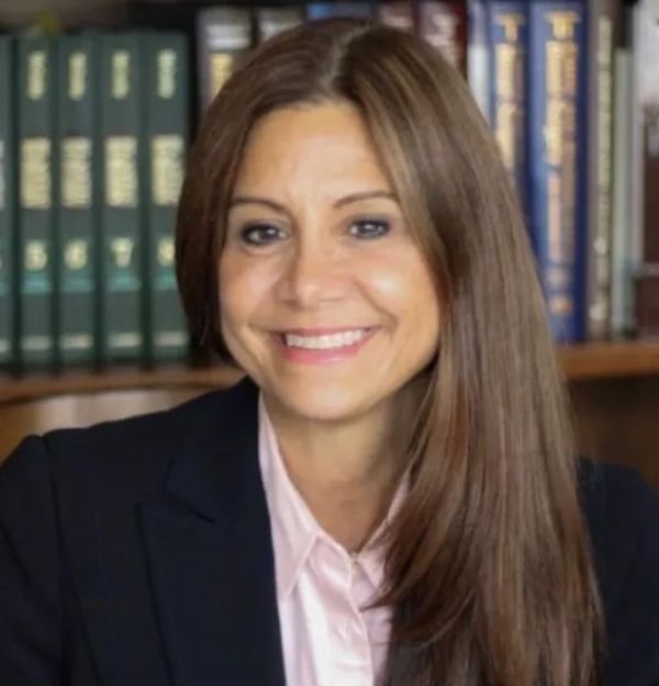 Ana M. Frexes, PA