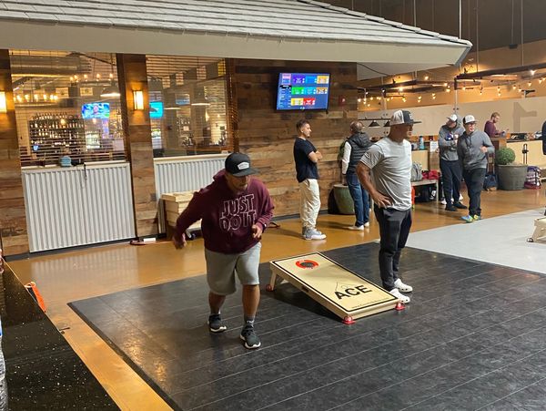 Cornhole - The Clubhouse Bistro and Bar