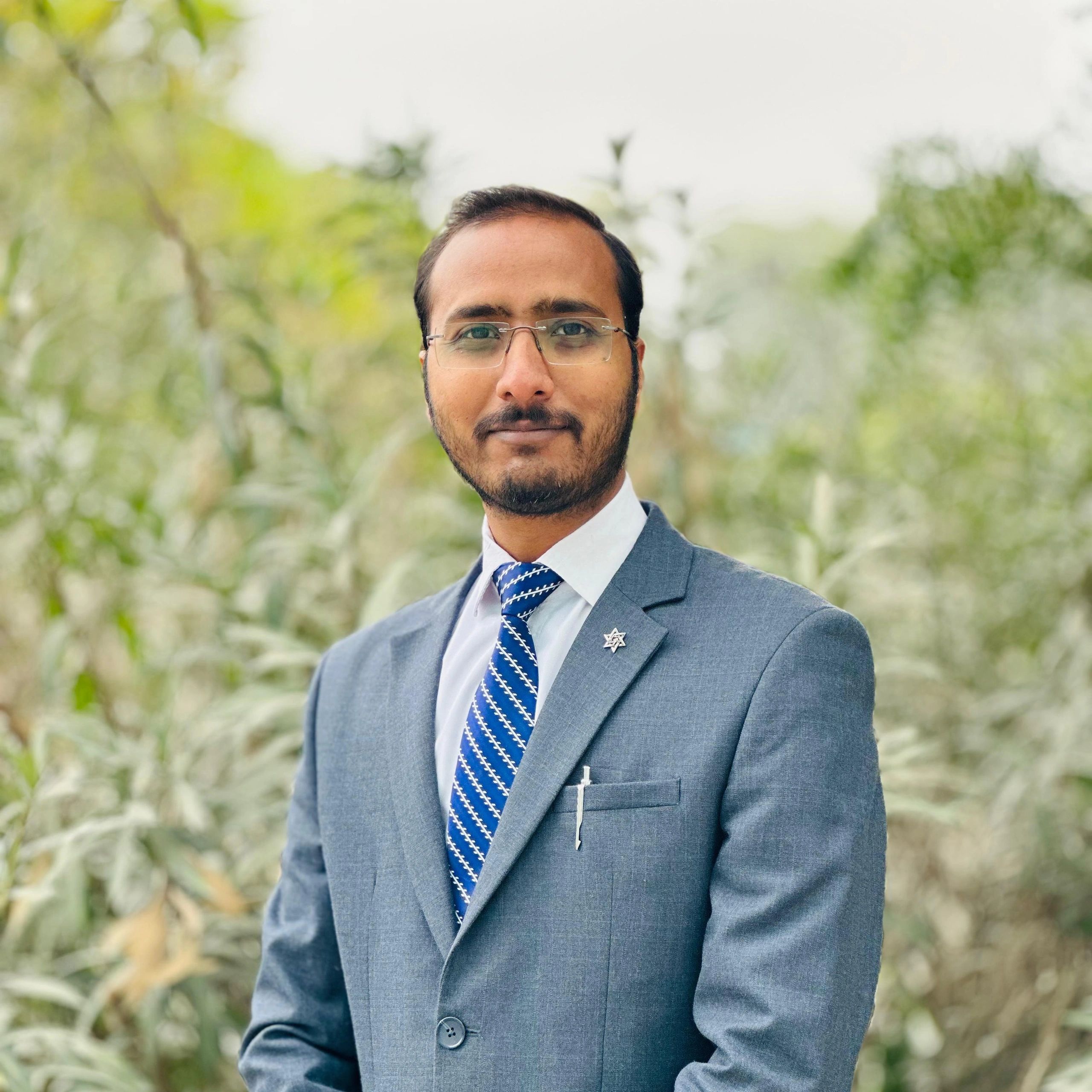 Dr. Shrivardhan Dheeman