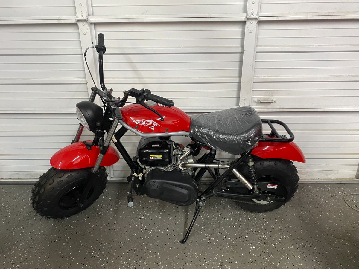 Coleman MB200 with universal brace. (no trumpet)