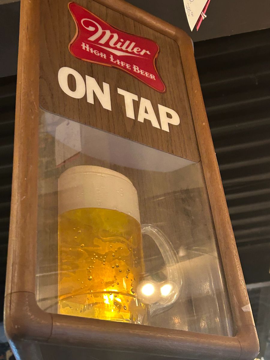 Vintage 1982 lighted rotating Miller sign