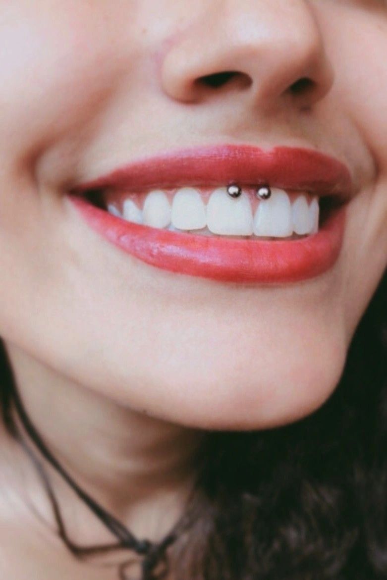 Smiley Piercing A Smile with Caution