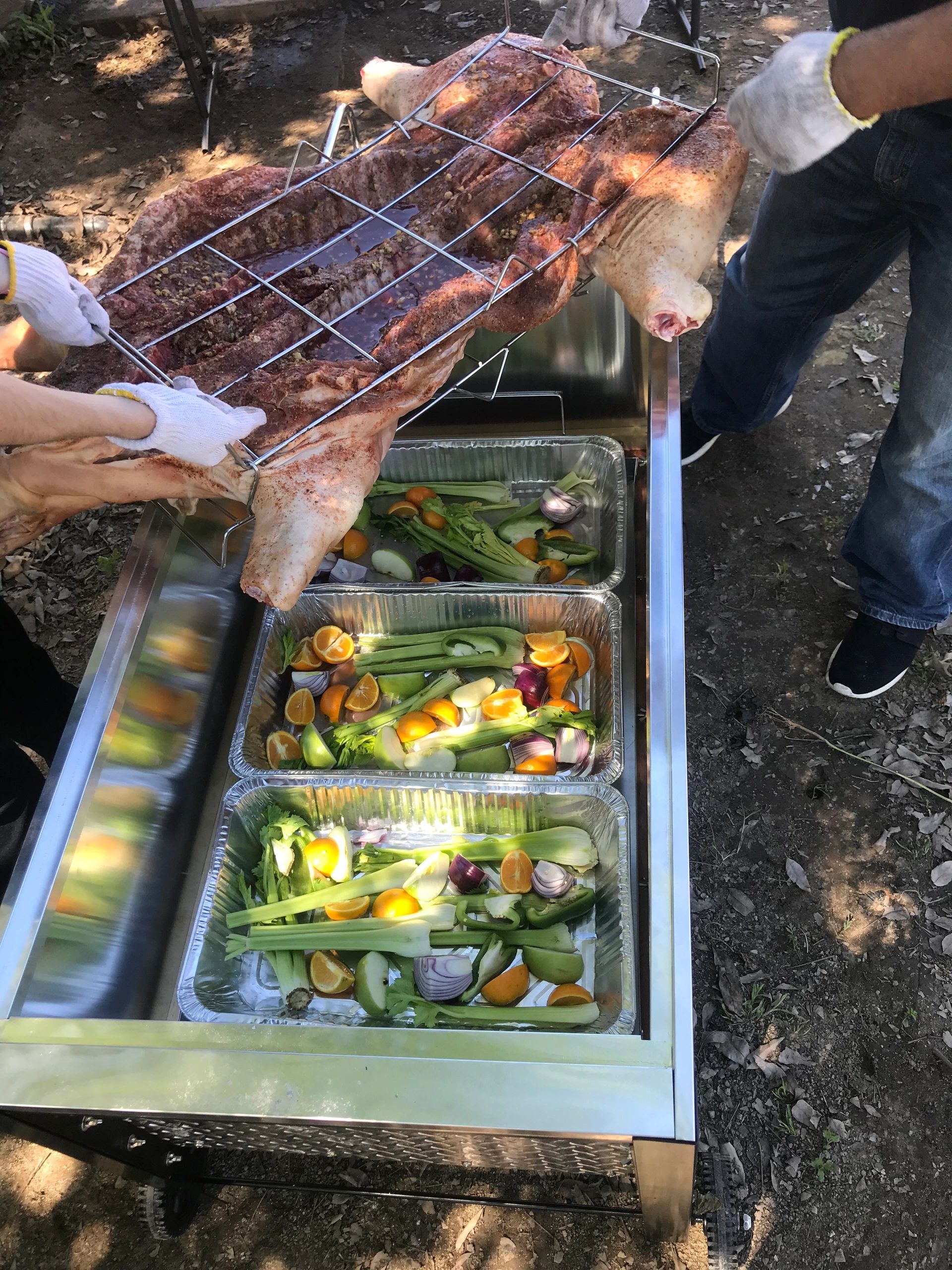 How to cook a Whole Pig - Cuban Style in a La Caja China