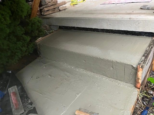 Revitalizing Entryways: Replacing a Sagging Step and Sidewalk