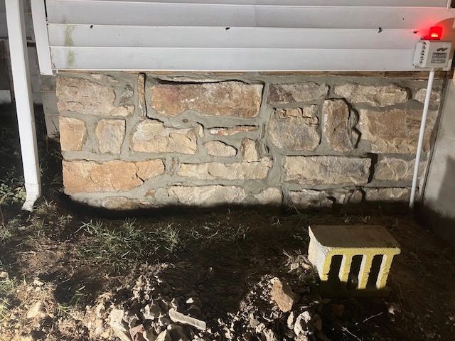 Revitalizing Foundations: Repointing an Old Stone Foundation