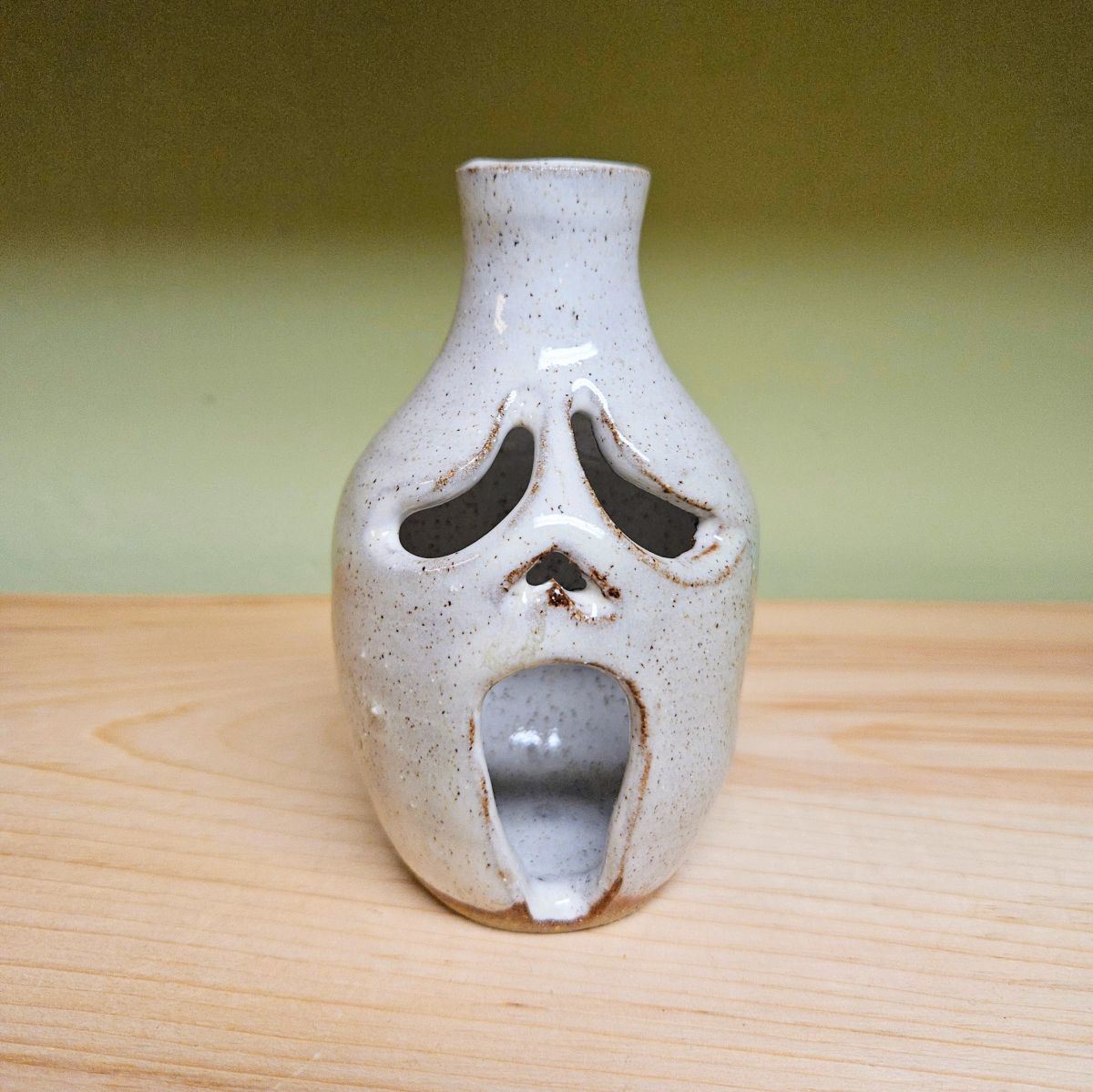 White Glazed Ceramic Spooky Face Vase