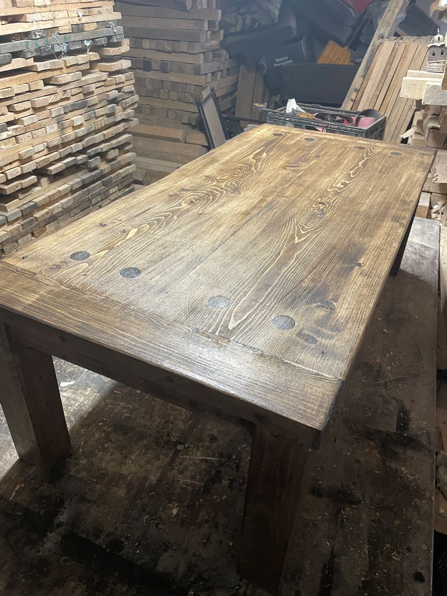 Peg Coffee table 4 ft Long 2 ft wide in a dark walnut stain