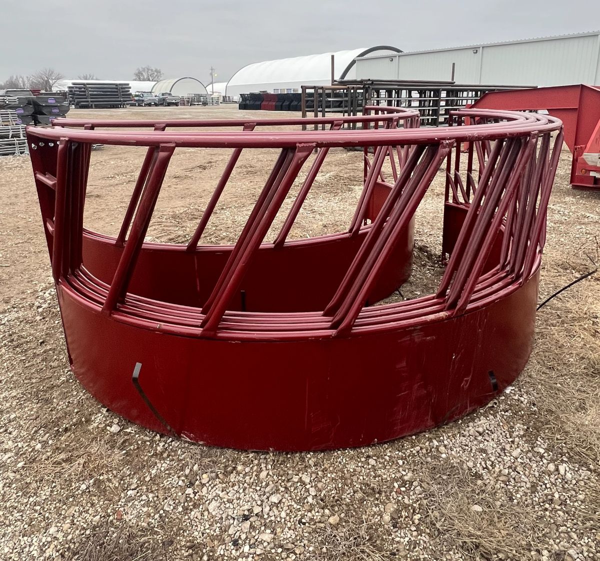 Yoder cattle feeder with metal skirt