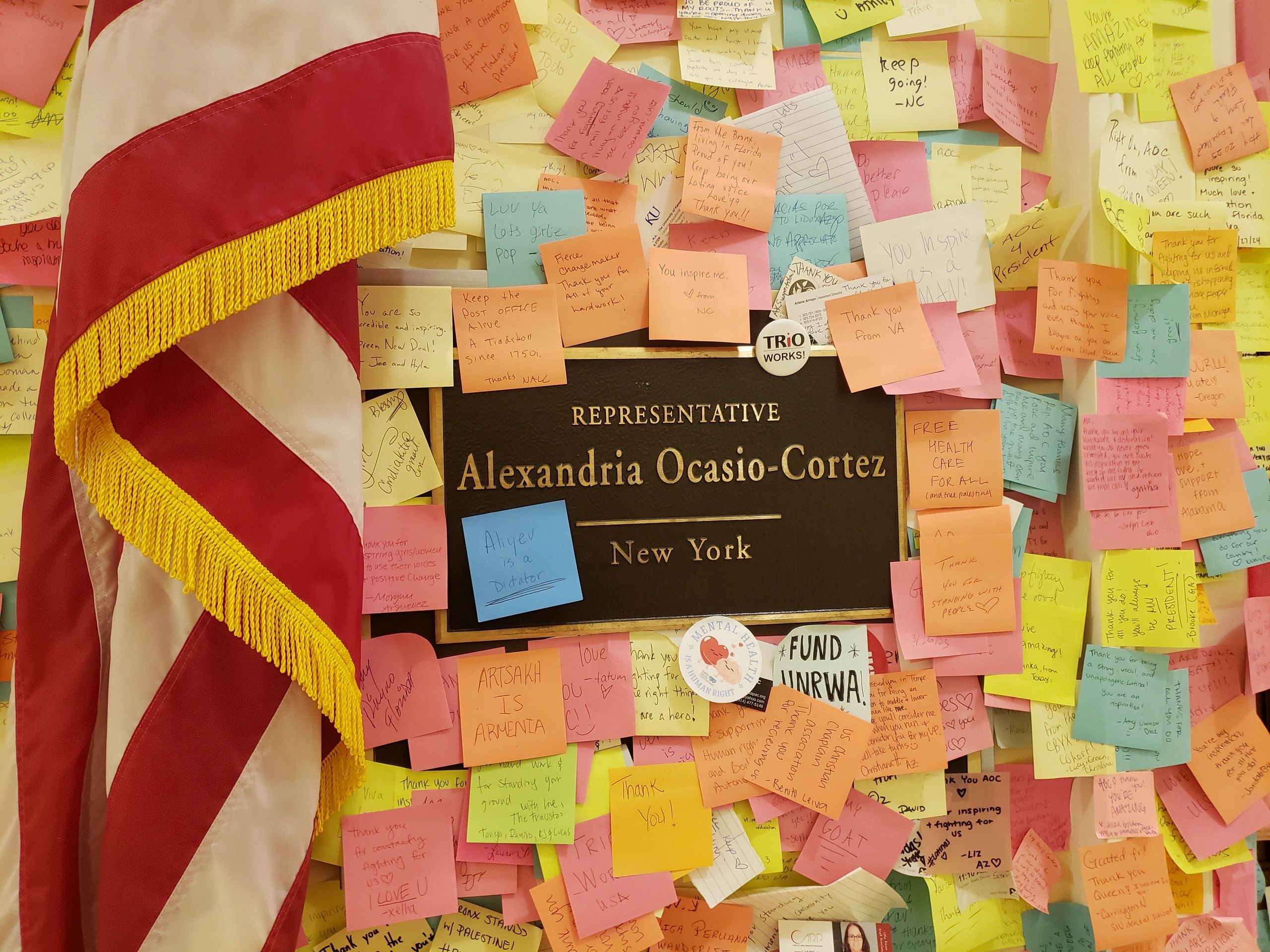 AOC Decorates Office Doorway With Notes Like "I Heart Abortion"