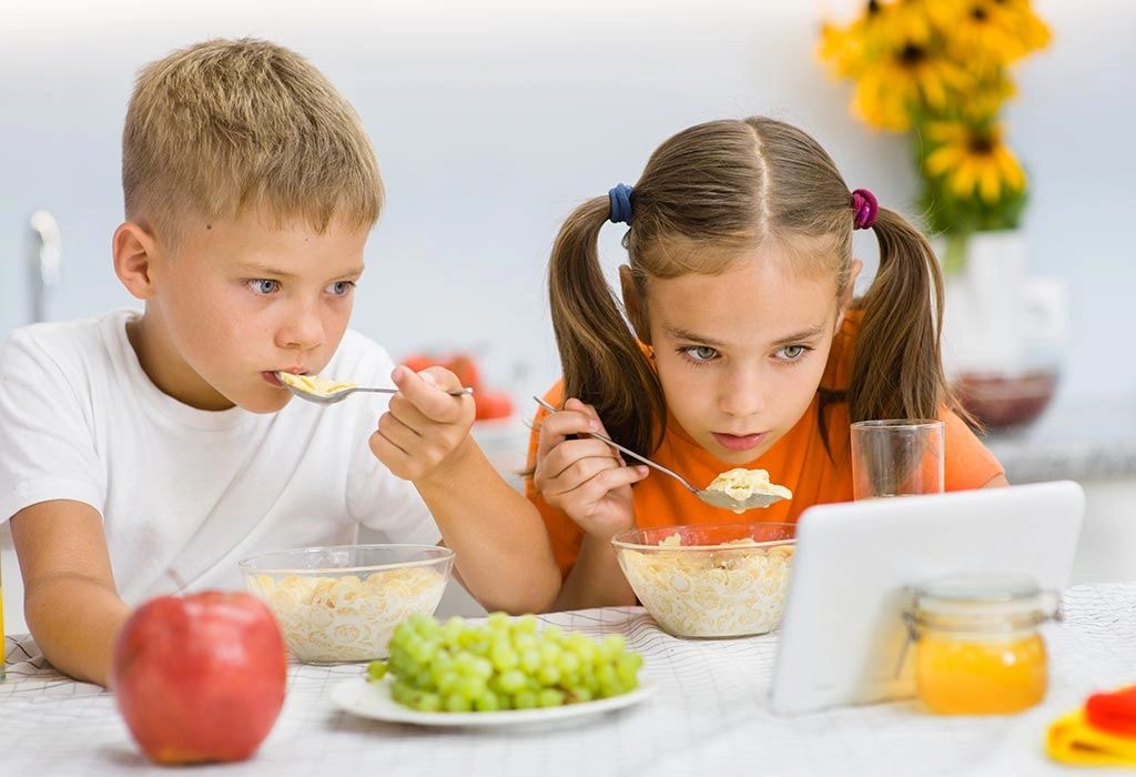 Why Using Mobile Phones While Eating Is Dangerous for Your Child?