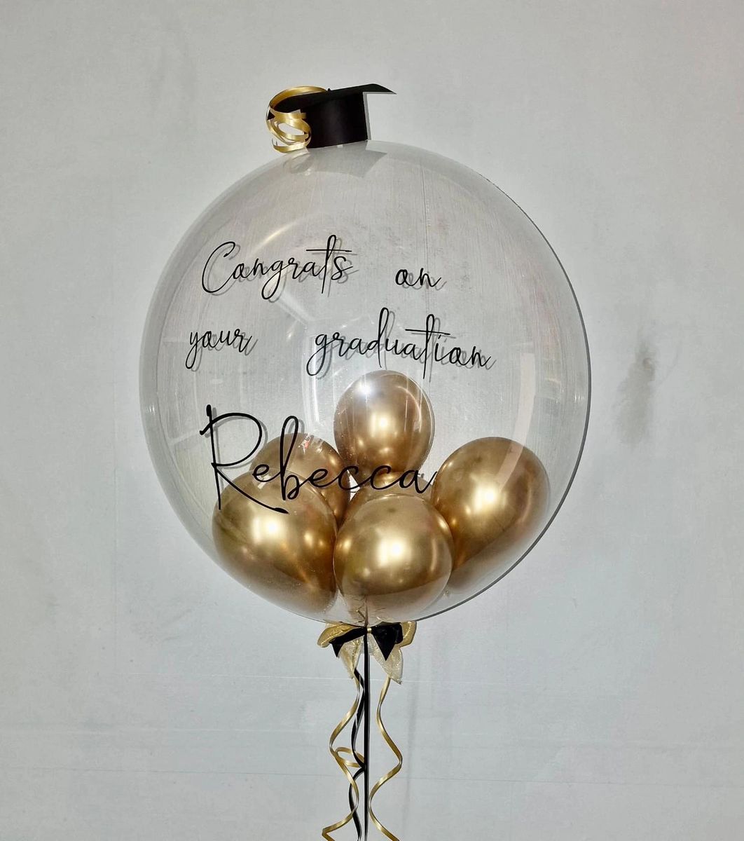 Gold graduation bubble balloon