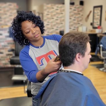 Mel's Barber Shop Team - Mel's Barber Shop