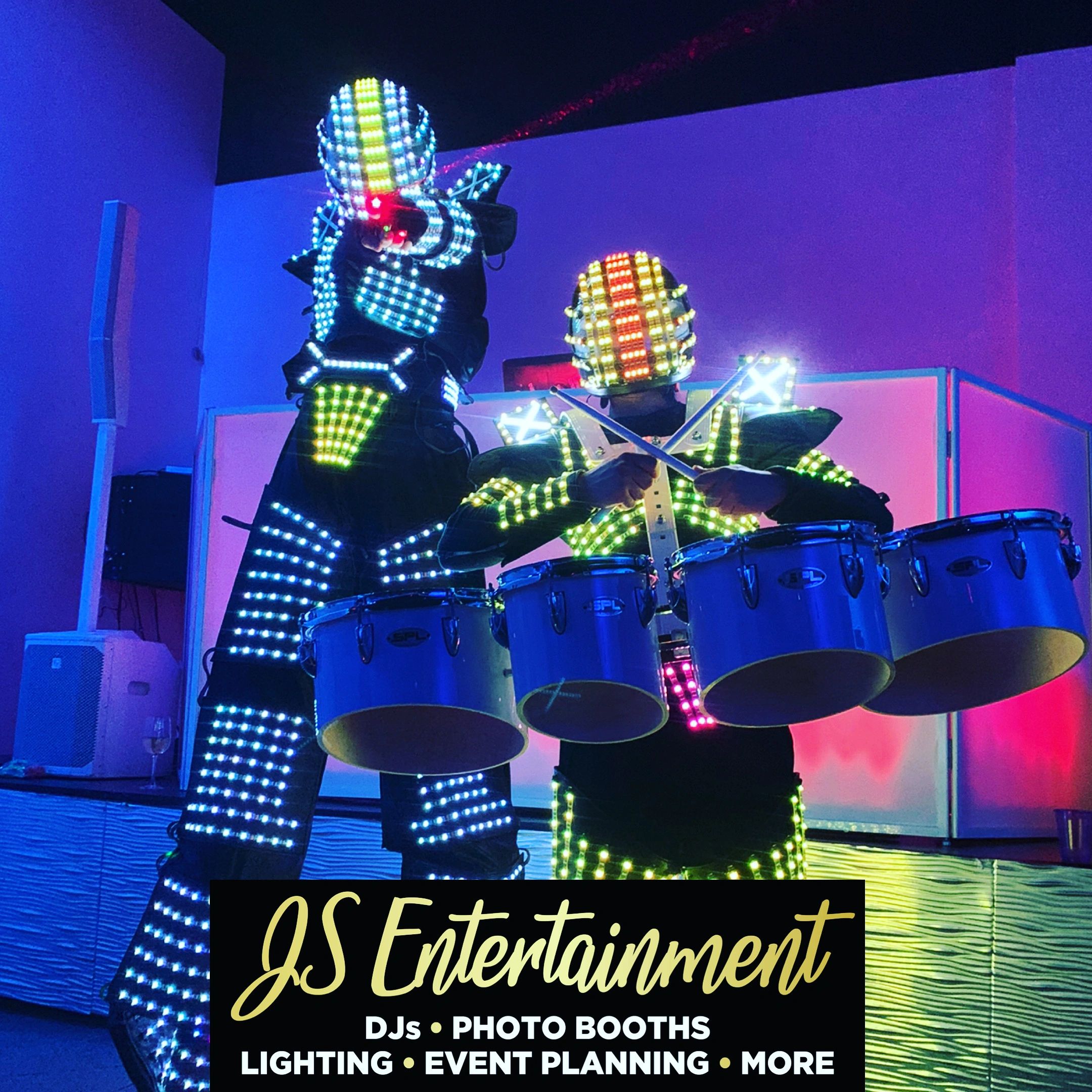Elevate your event with LED Robots and Performers!