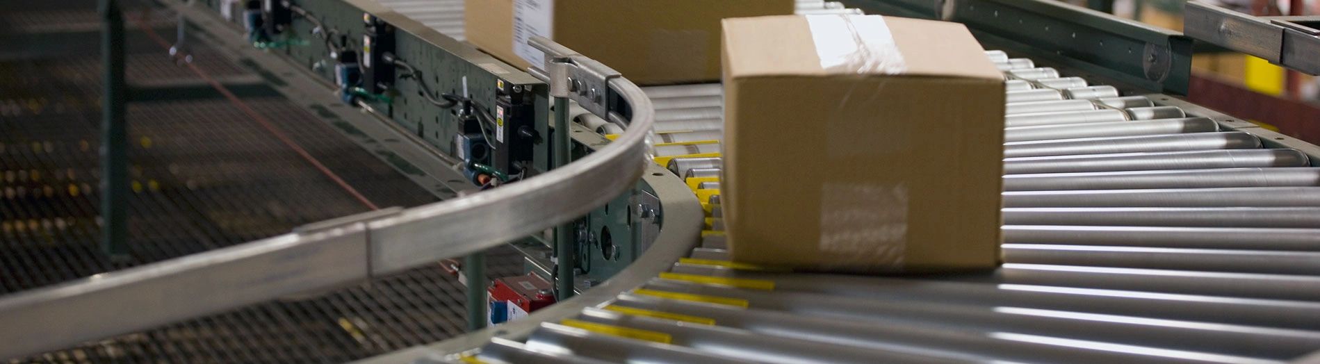 Baumann Packaging Systems - Packaging Machine, Cross Web Labellers