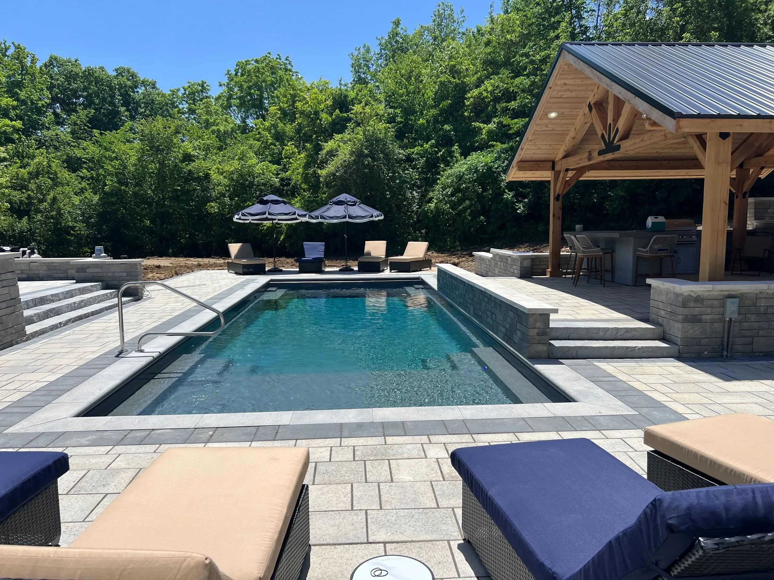 Pool Builder - Infinity Pools & Stoneworks Inc