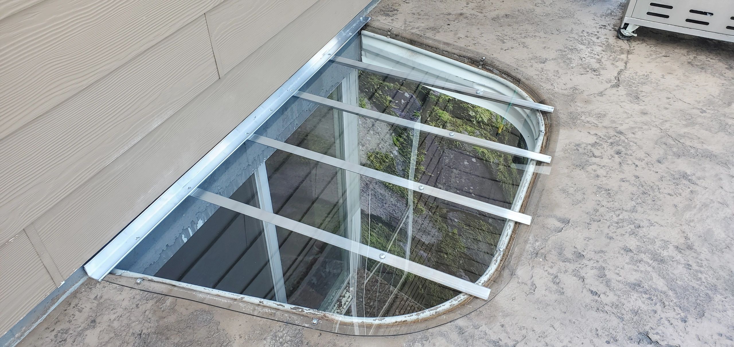 Polycarbonate Window Well Covers vs. Metal Window Well Covers
