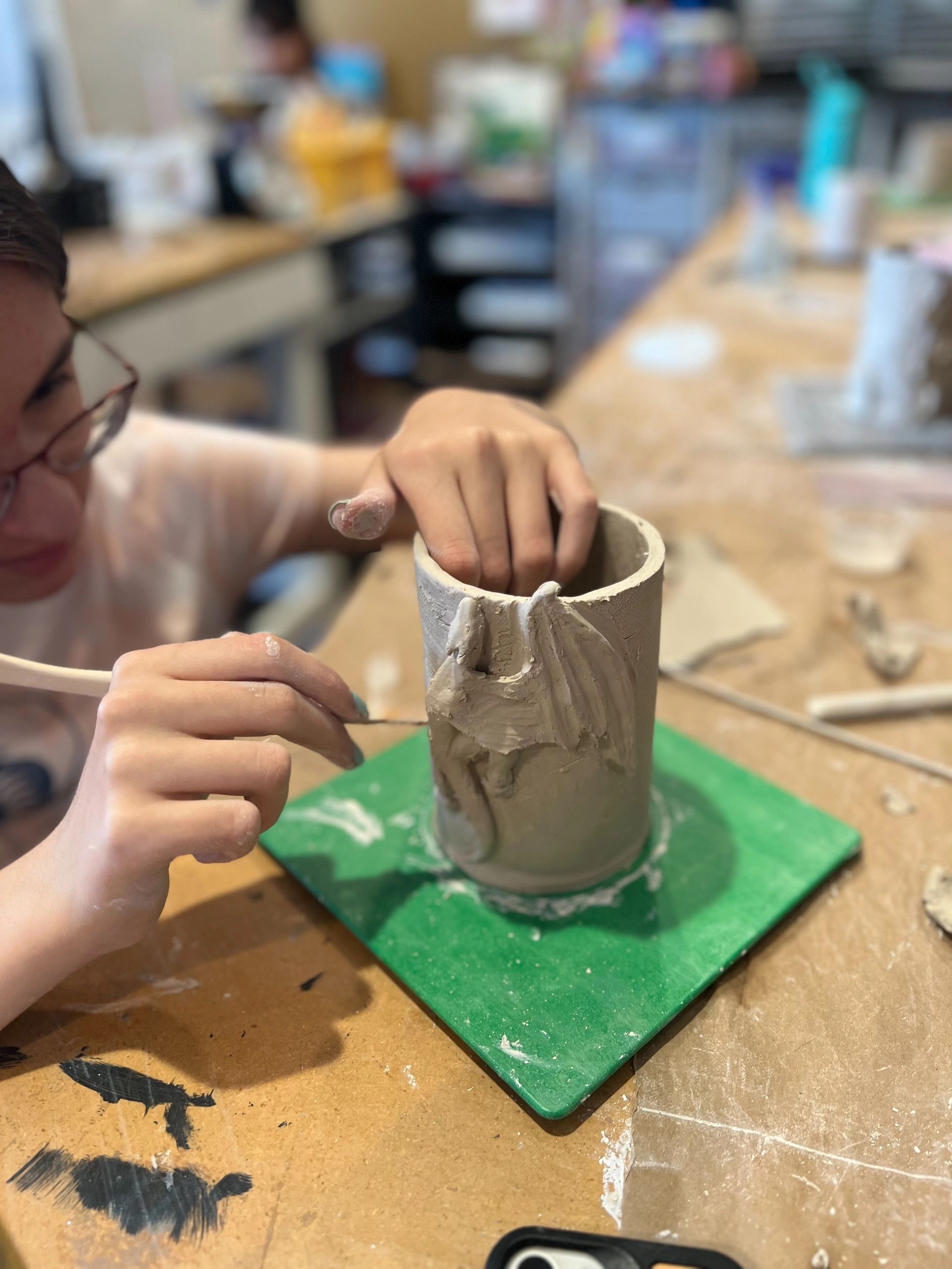 Clay Hand building Castles and Dragons