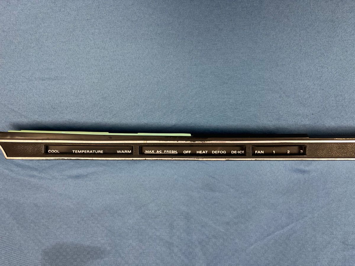 Lower dash and AC and heater control panel/Bezel
