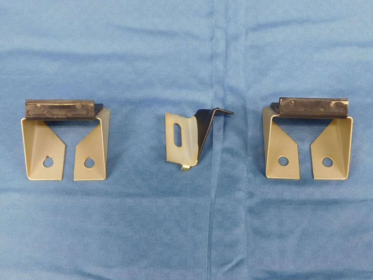 windshield support and wiper stop brackets.