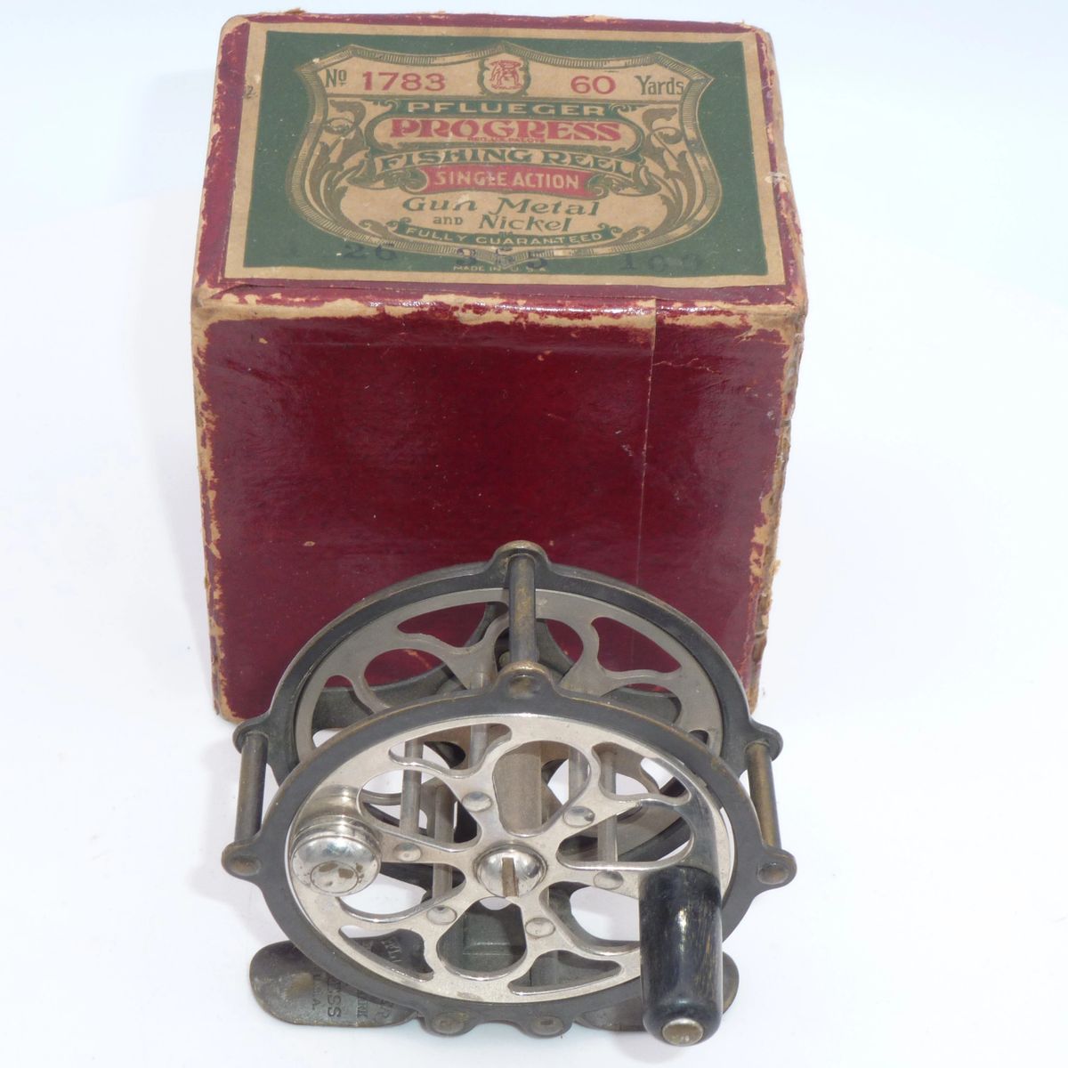 Pflueger Raised Pillar Fly Reel in Correct and Crisp Maroon Chimney Box